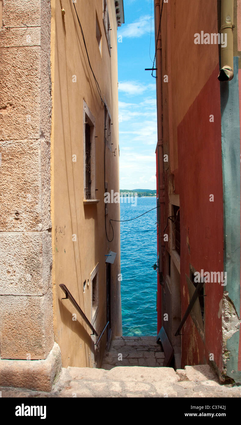Two houses with a small view to the ocean Stock Photo - Alamy