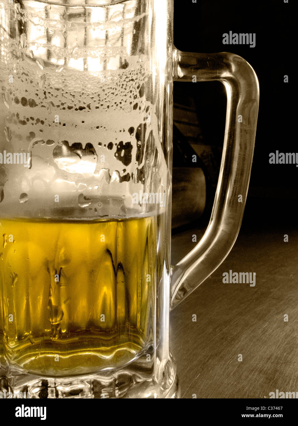 Glass lager beer half full in hi-res stock photography and images - Alamy