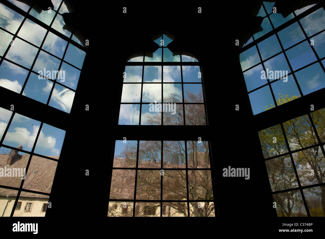 Looking out through an old leaded light window Stock Photo - Alamy