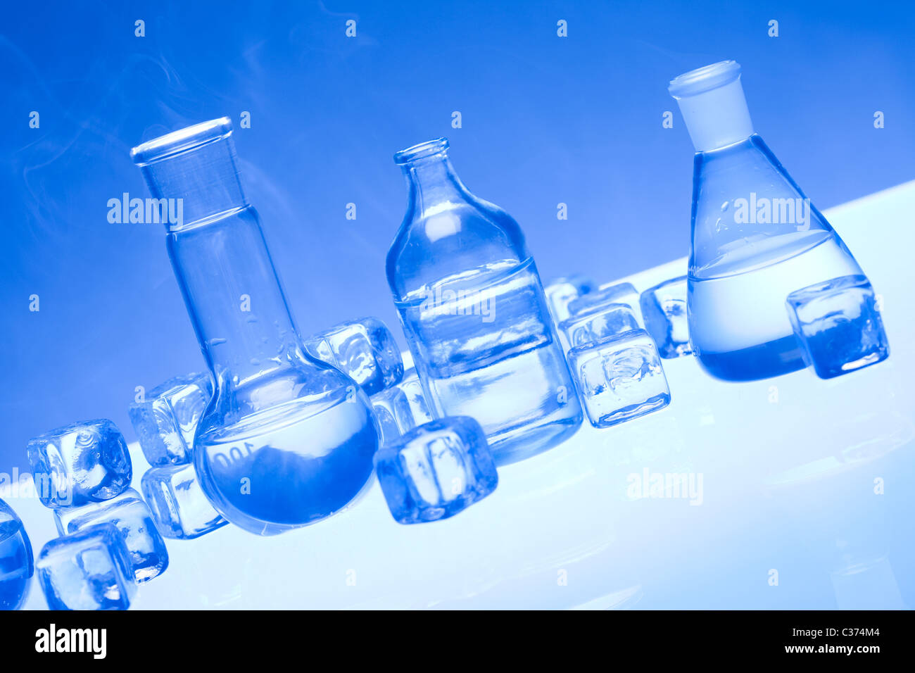 Laboratory glass in blue scenery Stock Photo - Alamy