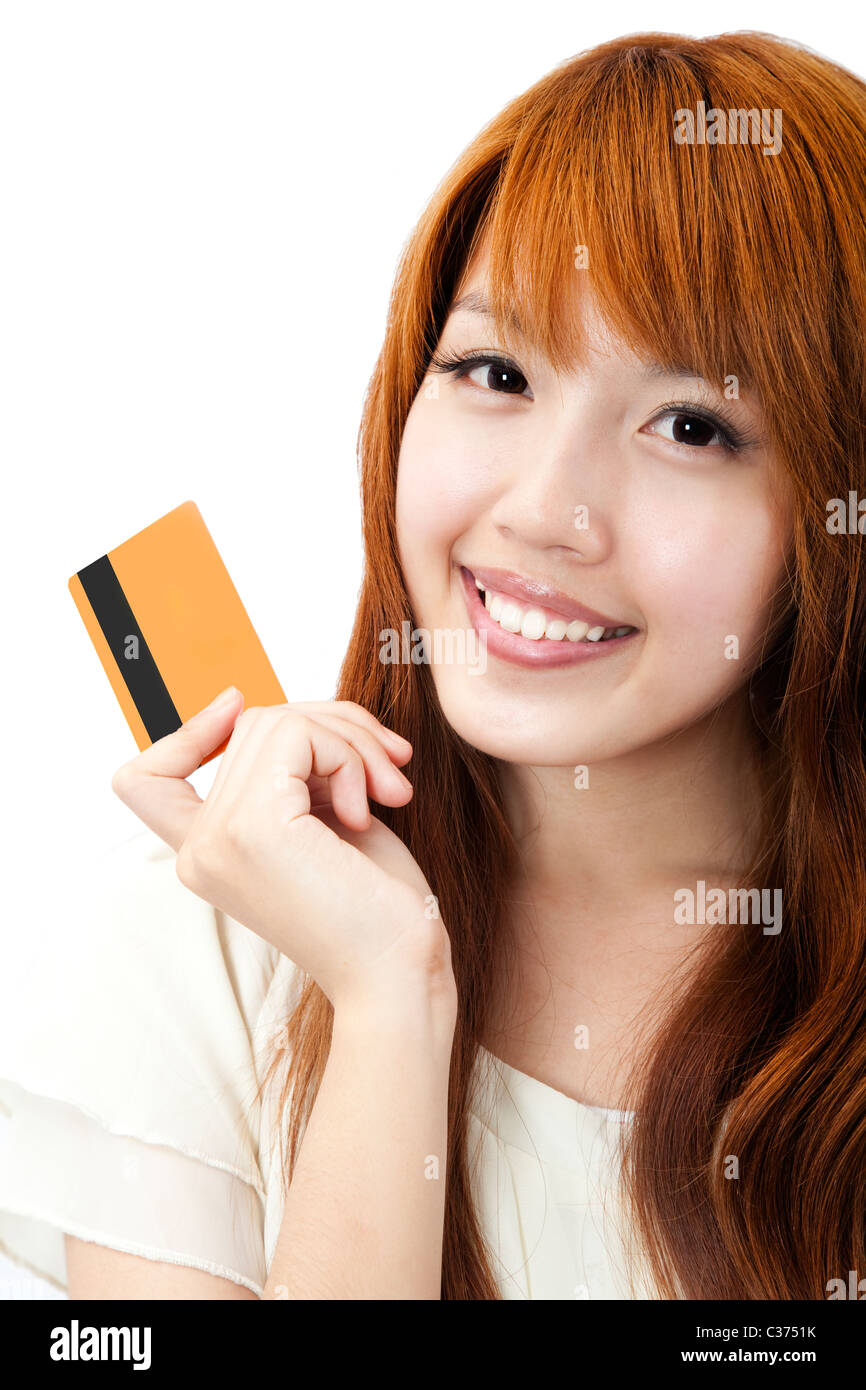 Portrait of the beautiful happy girl holding a credit card for shopping ...