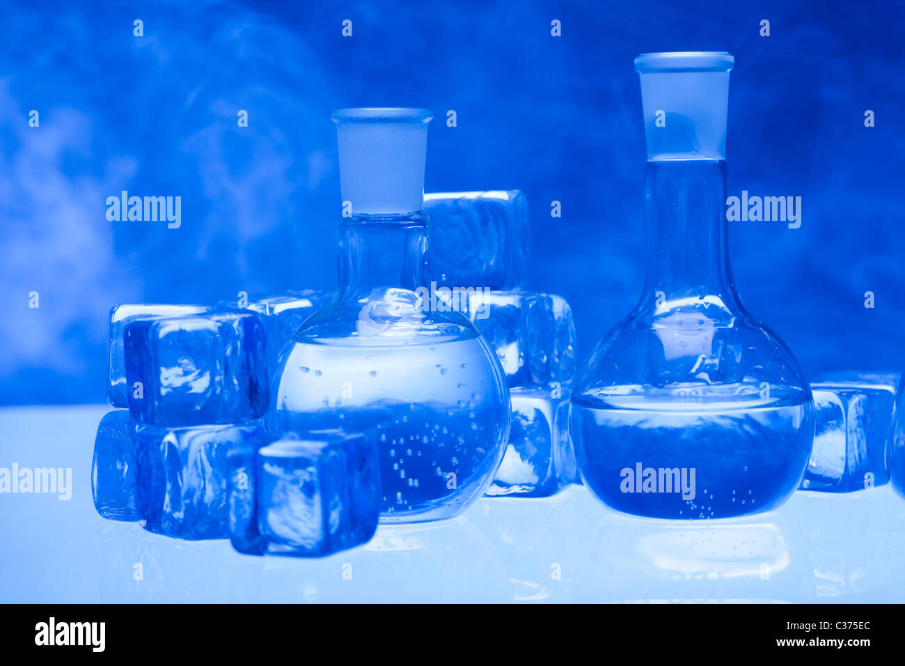 Laboratory glass in blue scenery Stock Photo - Alamy
