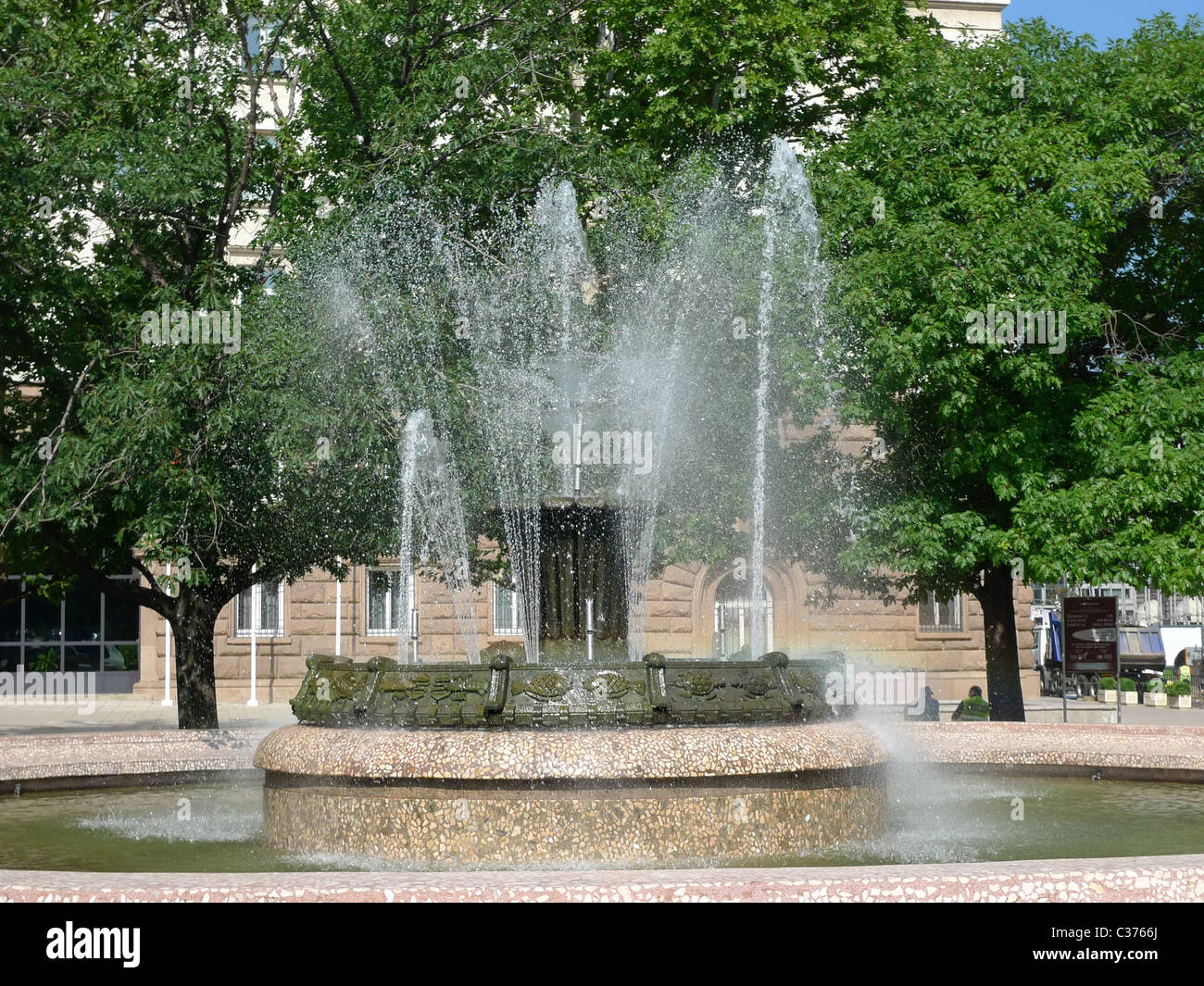 A fountain in a park Stock Photo - Alamy