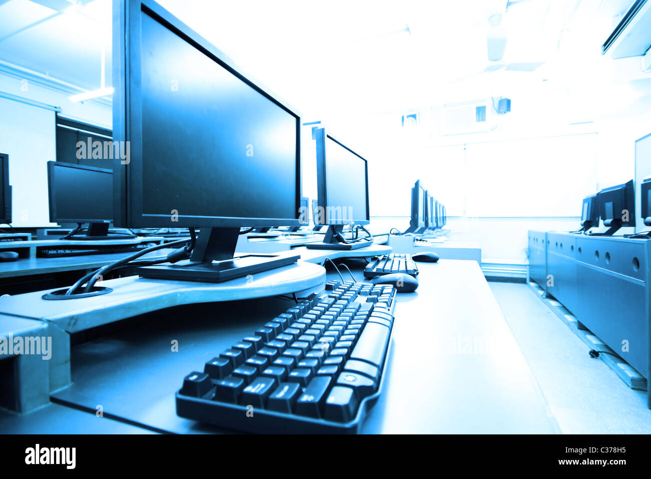 Workplace room computers in row hi-res stock photography and images - Alamy