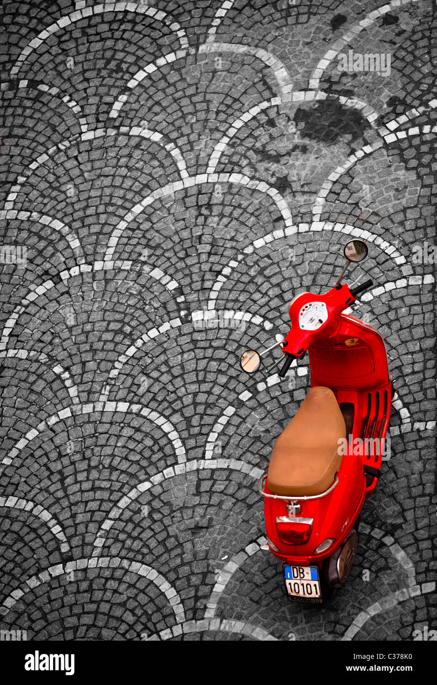Red Vespa scooter on a provisional square in Italy Stock Photo - Alamy
