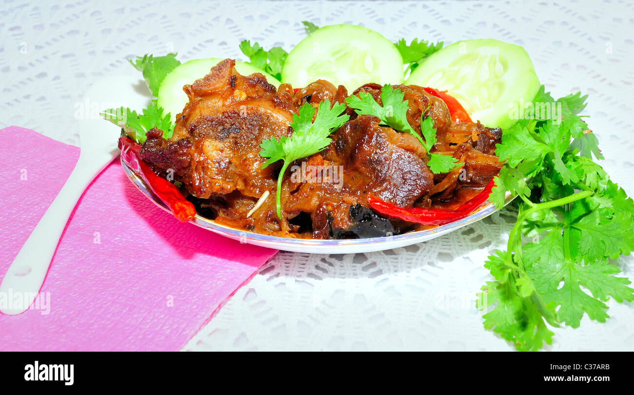 Juicy, delicious Mutton Korma (Meat curry, mutton curry) on a plate ...