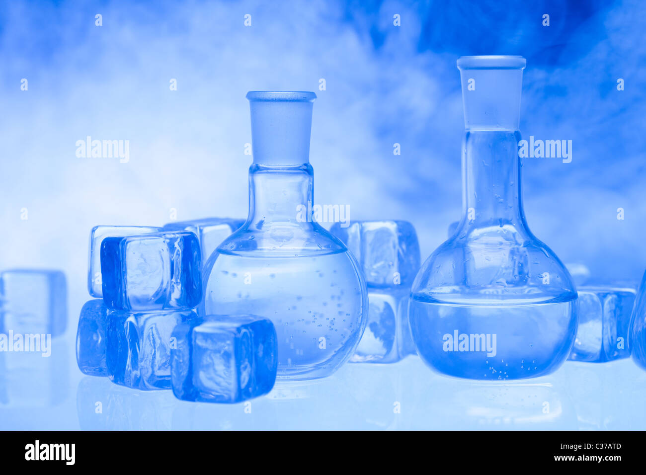 Laboratory glass in blue scenery Stock Photo - Alamy