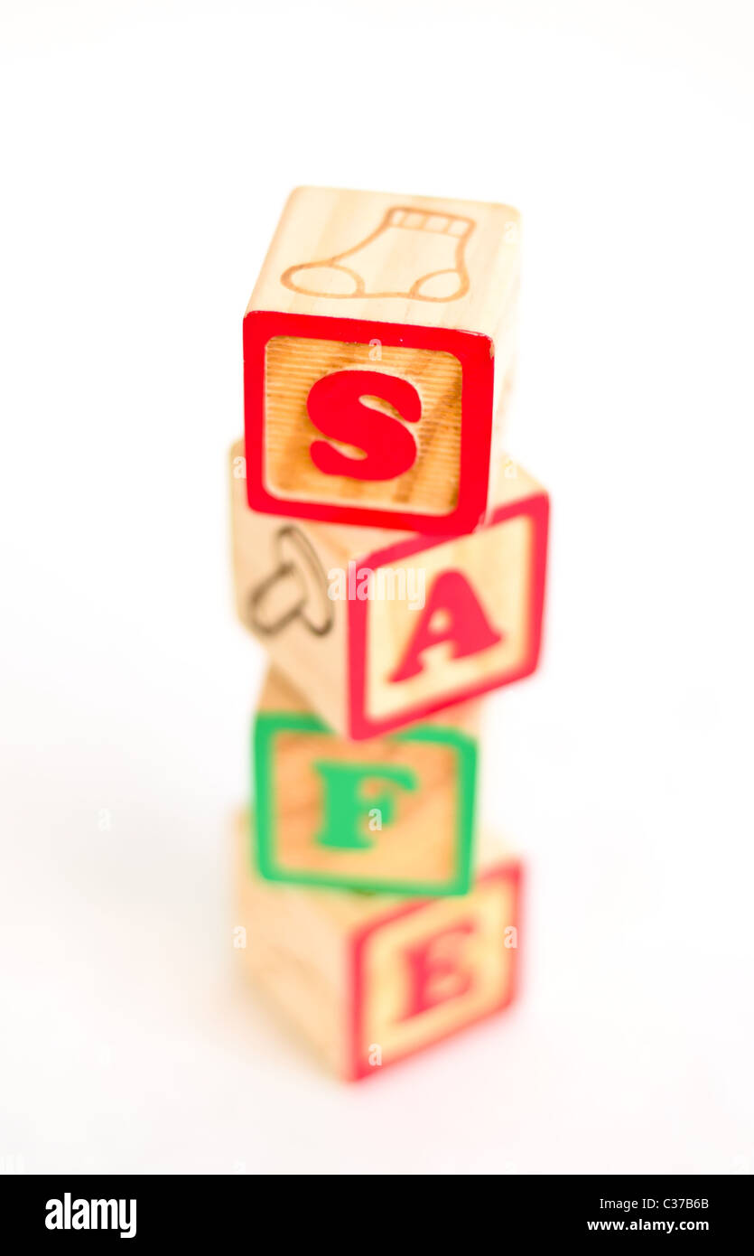 Vintage alphabet blocks spelling out Safe Stock Photo - Alamy