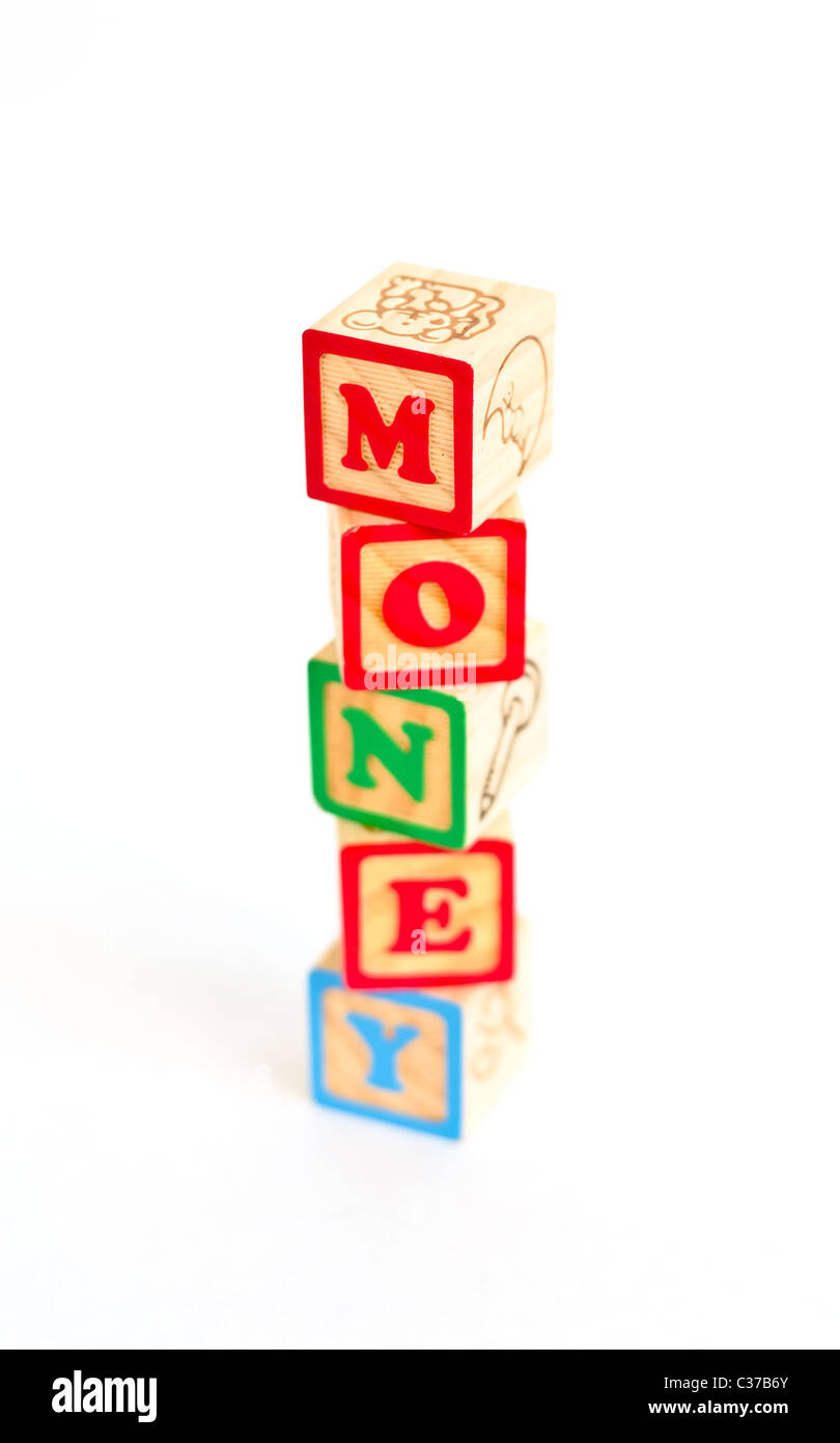 Vintage alphabet blocks spelling out MONEY Stock Photo - Alamy