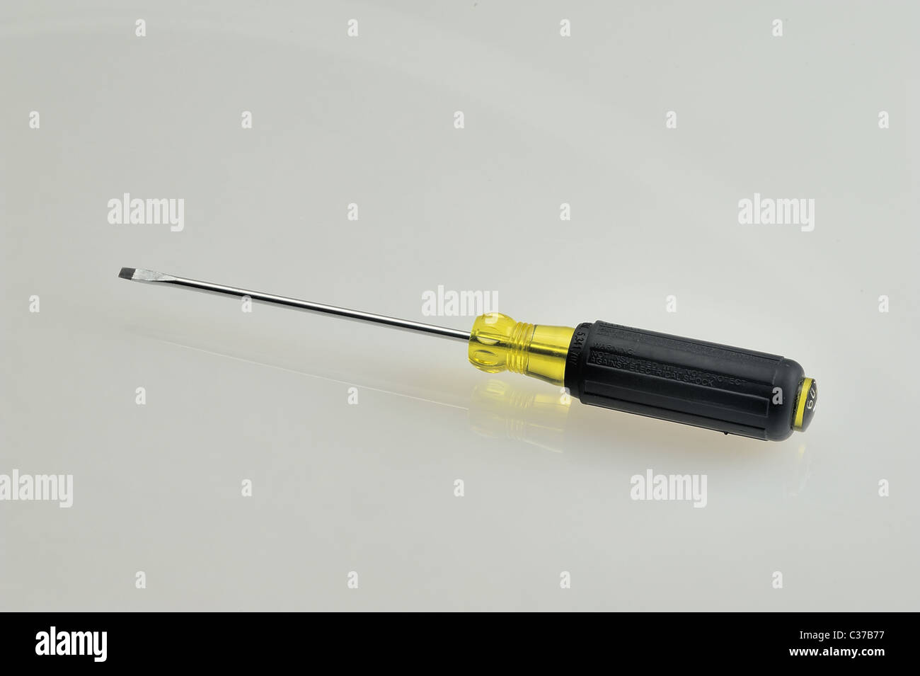 screwdriver on neutral white background Stock Photo - Alamy