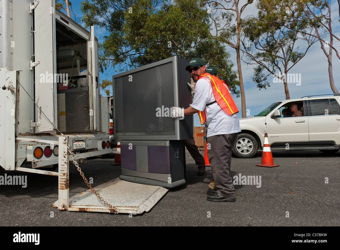 Recycling worker help in the collection, sorting, and packing of ...