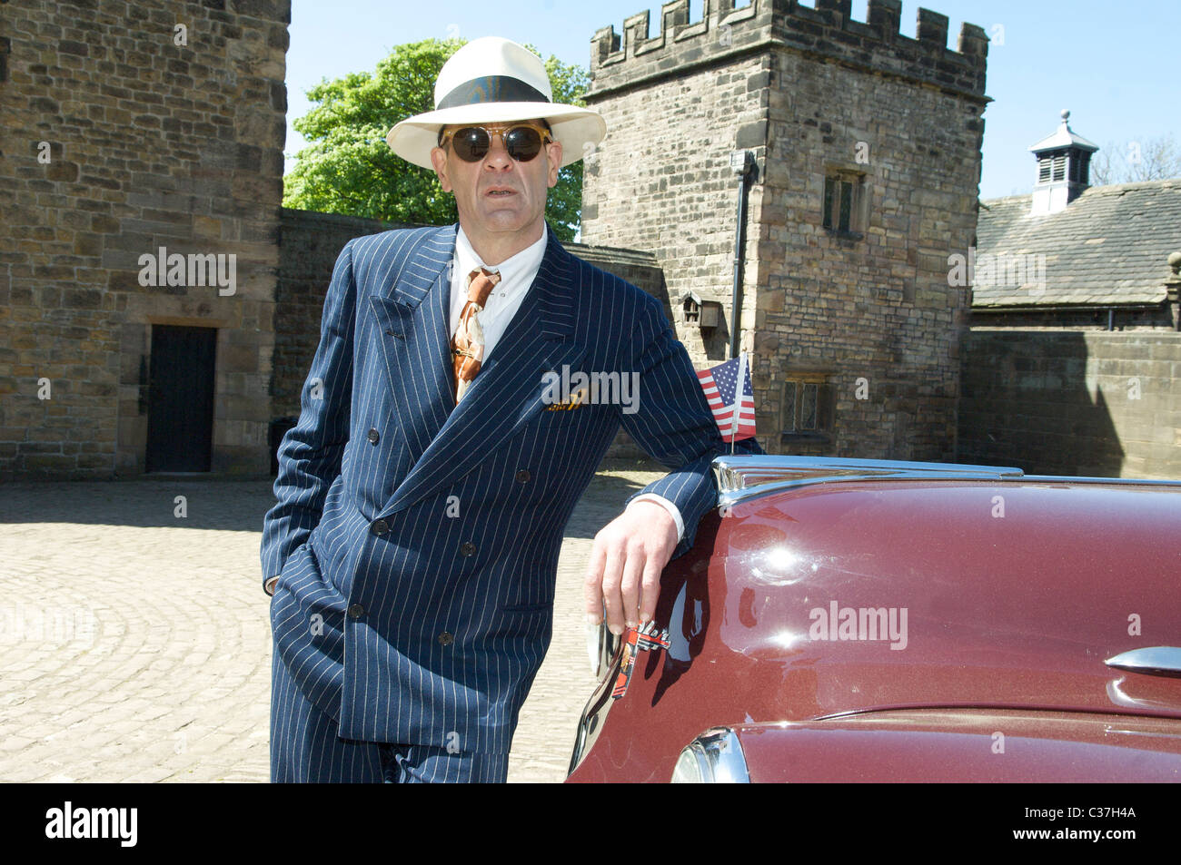 1940s style US government agent in 1942 Chrysler New Yorker car Stock ...