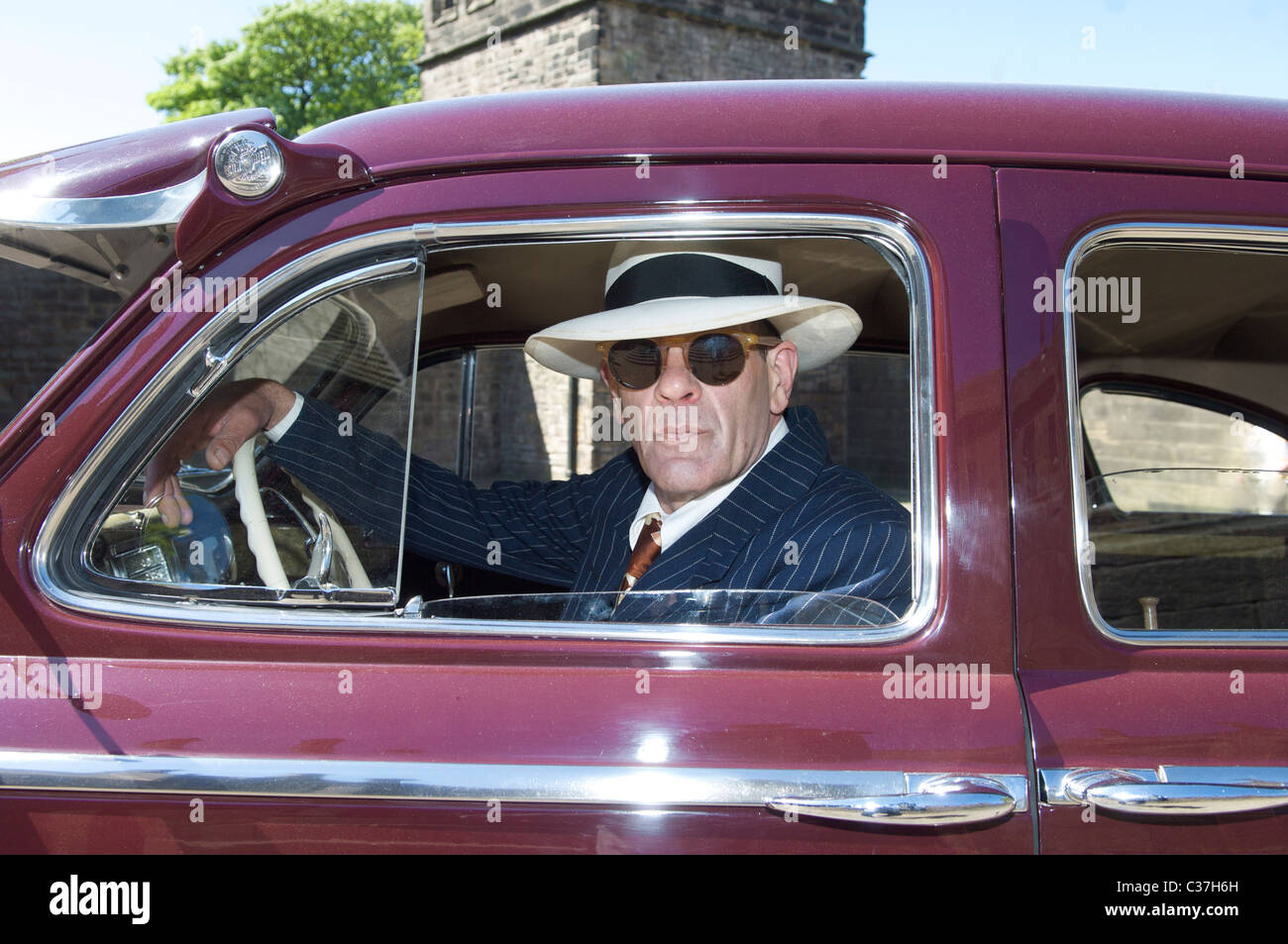 1940s style US government agent in 1942 Chrysler New Yorker car Stock ...