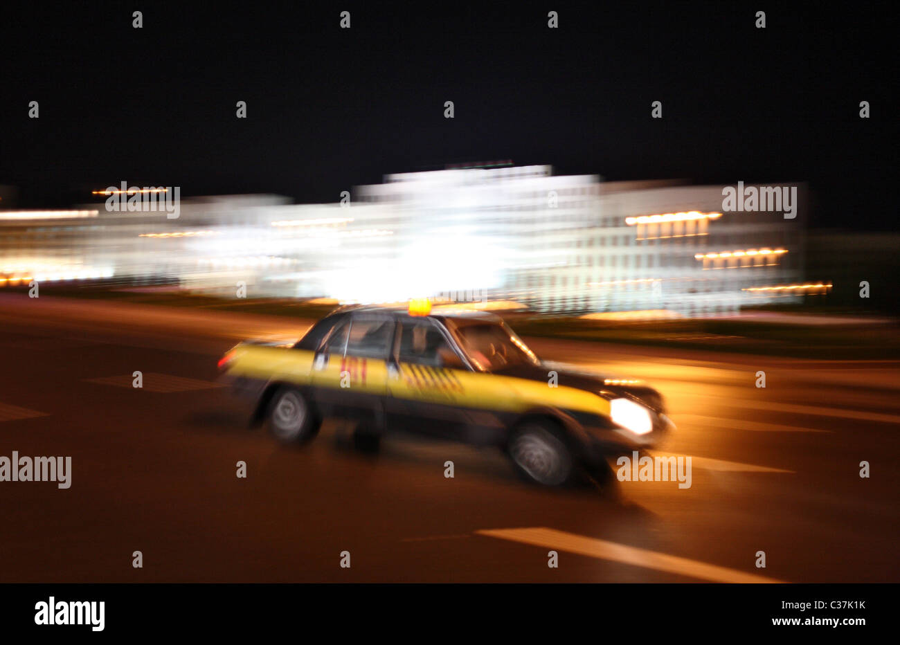 A taxi in front of a building, Minsk, Belarus Stock Photo - Alamy
