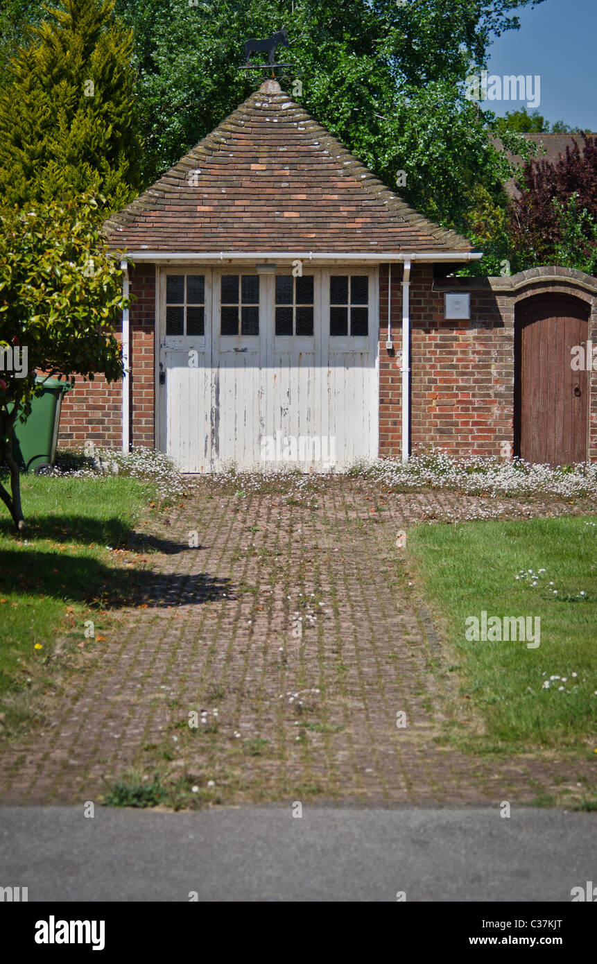 Tiled roof garage of thirties house Stock Photo - Alamy