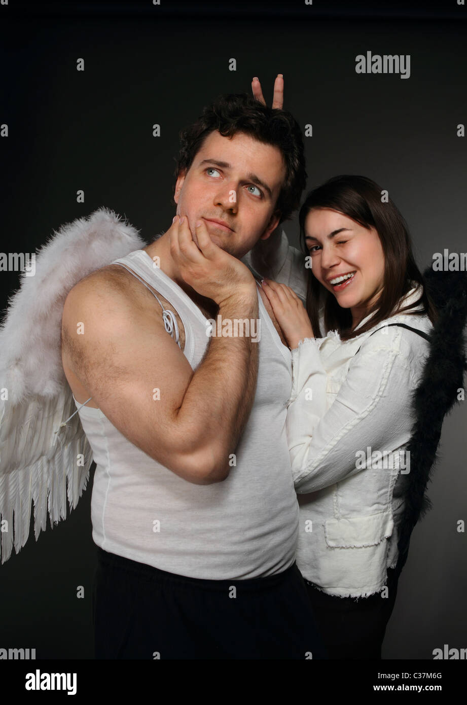 Mr. Angel and Mrs. Angel. Creepy character portrait Stock Photo - Alamy