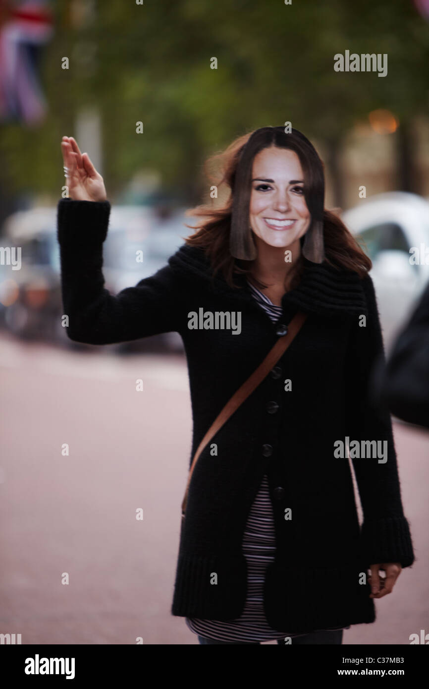 Woman waving wearing a Kate Middleton mask on the mall Stock Photo - Alamy