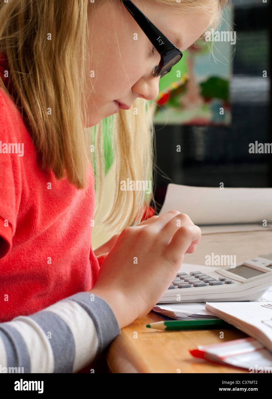 A girl doing homework Stock Photo - Alamy