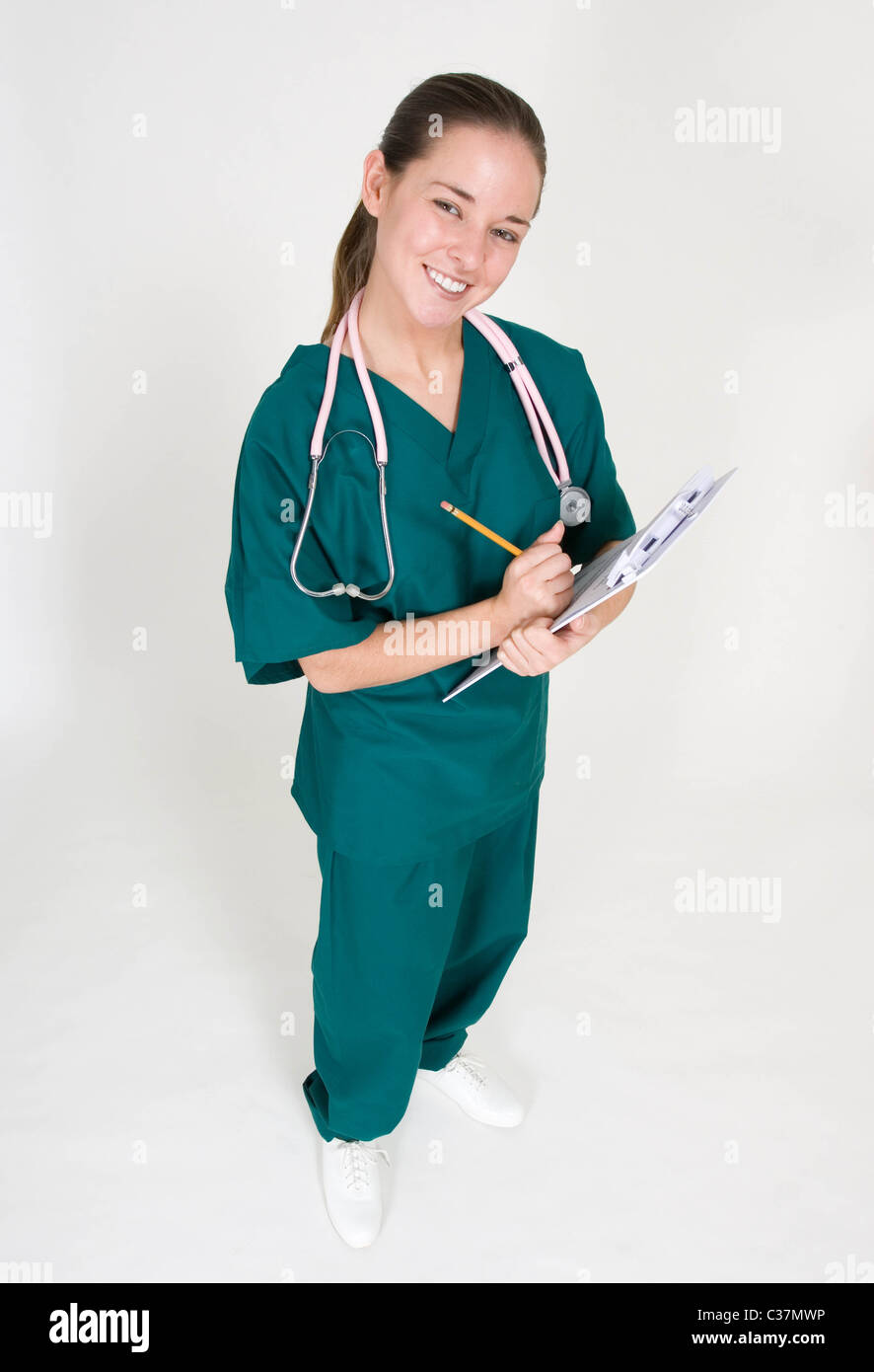 Portrait of young nurse holding patient chart, smiling Stock Photo - Alamy