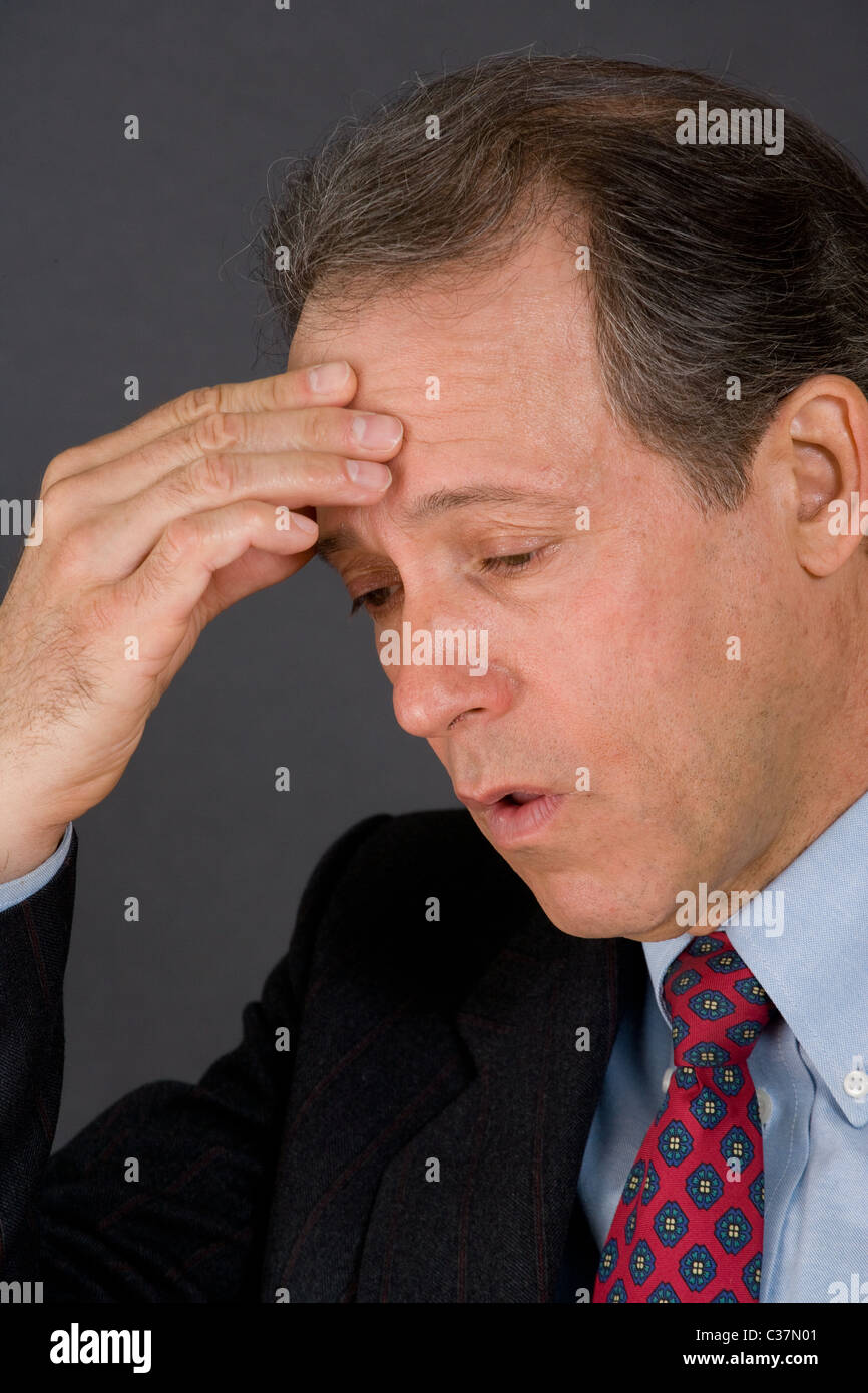 Portrait of Stressed Businessman Stock Photo - Alamy