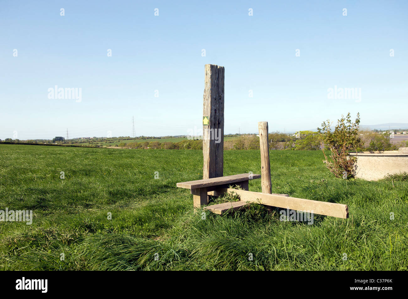 Stile stood in empty field Stock Photo - Alamy