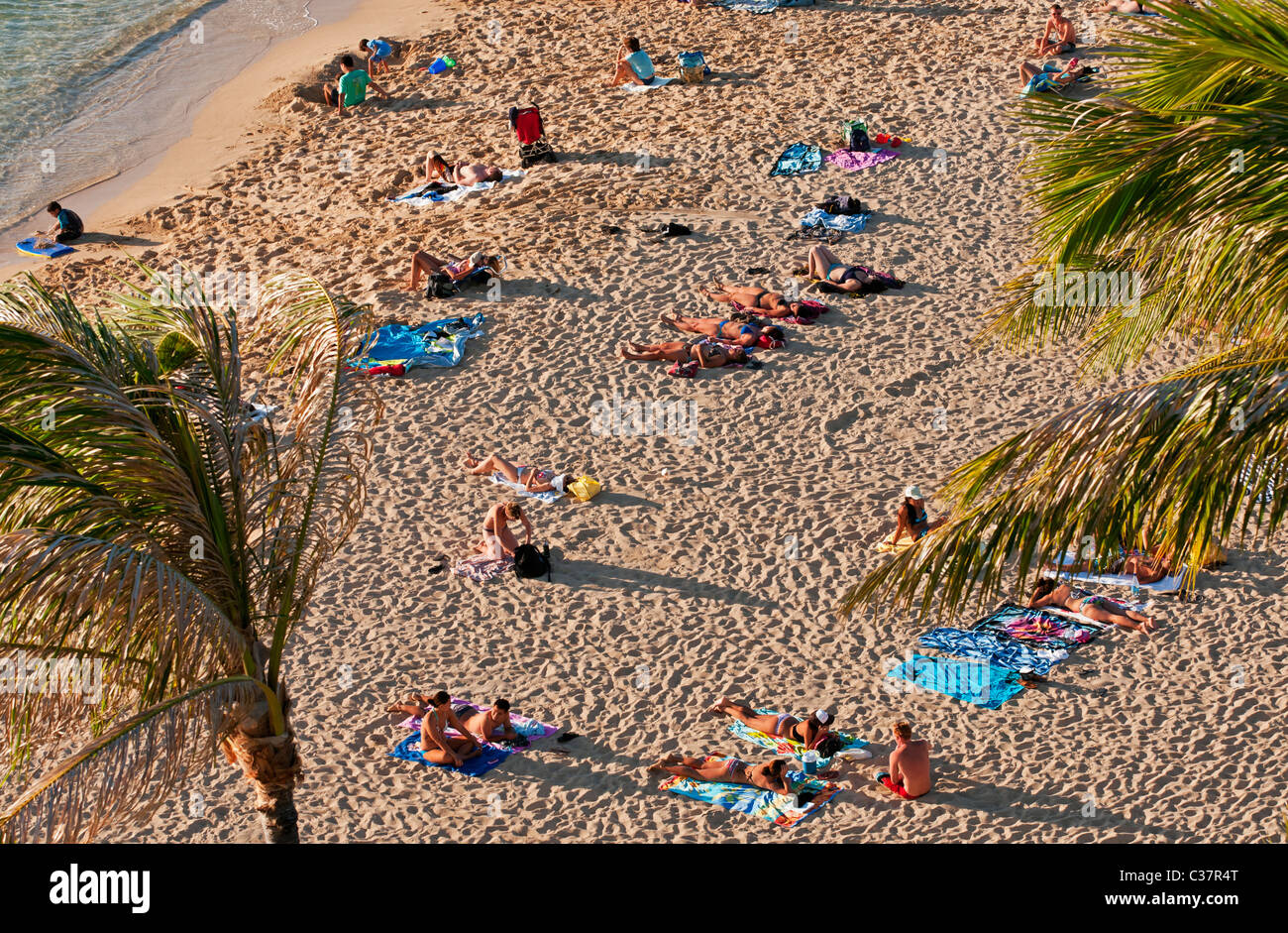 Sunbathers, Sans Souci Beach, Honolulu, Hawaii Stock Photo - Alamy