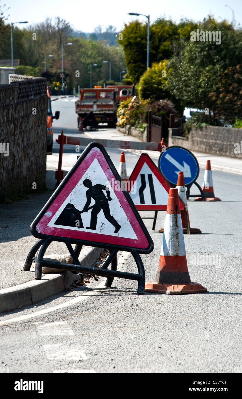 Series of road signs warning of road works, the narrowing of the ...
