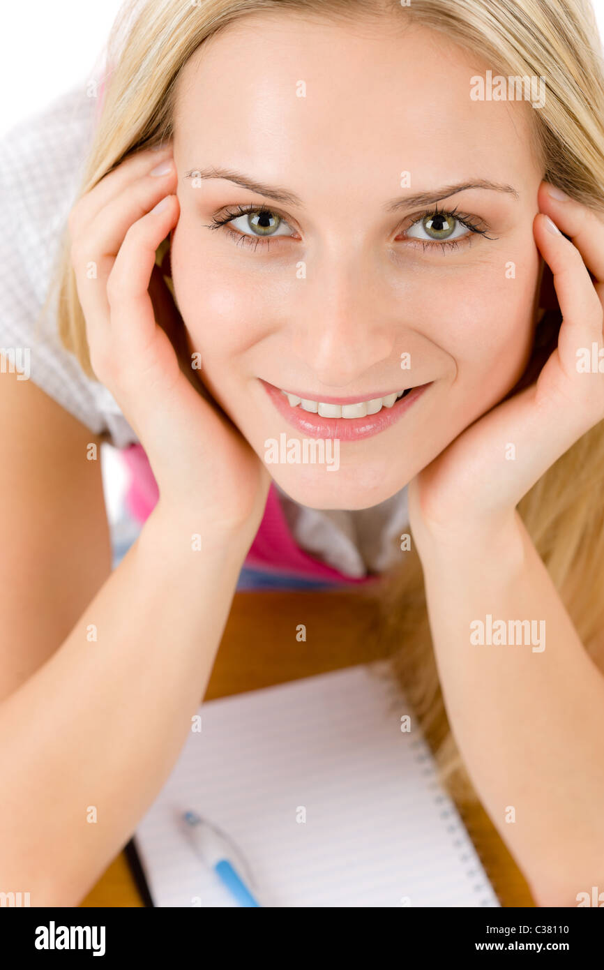 Portrait of happy student woman write homework at table Stock Photo - Alamy