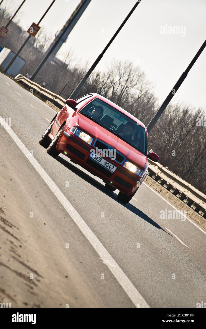red car on the highway Stock Photo - Alamy