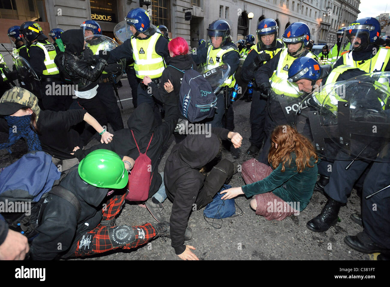 Scuffles break out as protesters confront police blocking their way ...