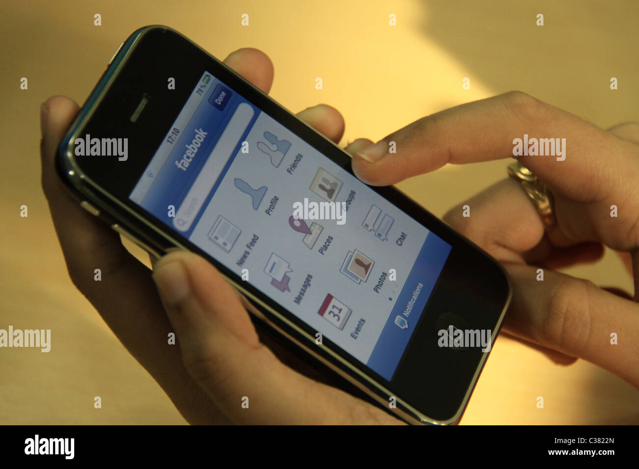 Lady using iphone Stock Photo - Alamy