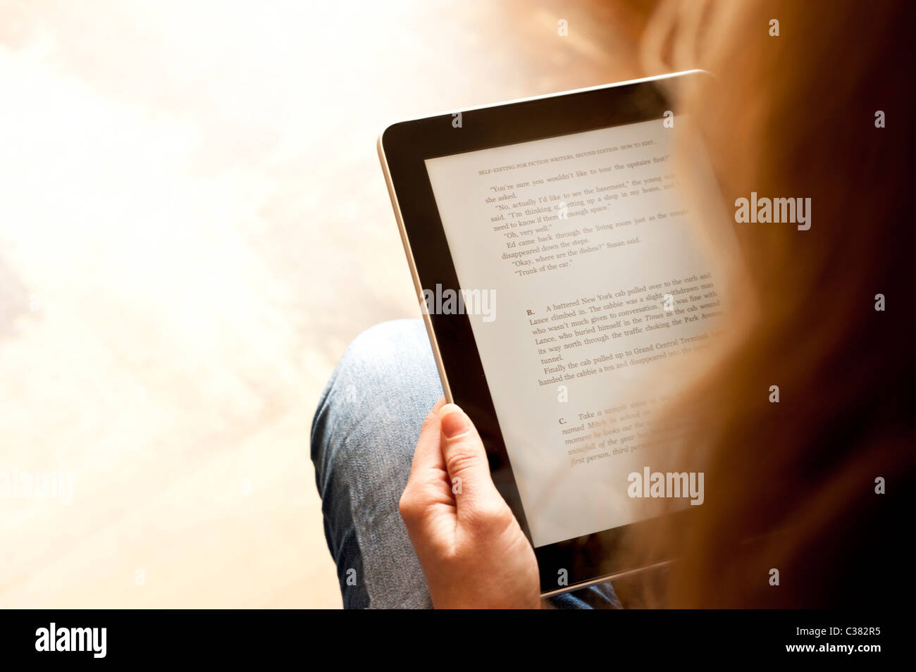 girl reading an e-book with iPad Stock Photo - Alamy