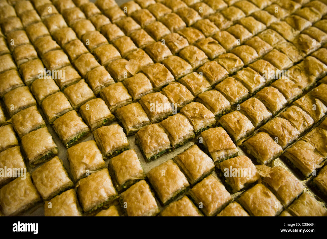 A big tray of sweet and delicious Baklava sweets Stock Photo - Alamy