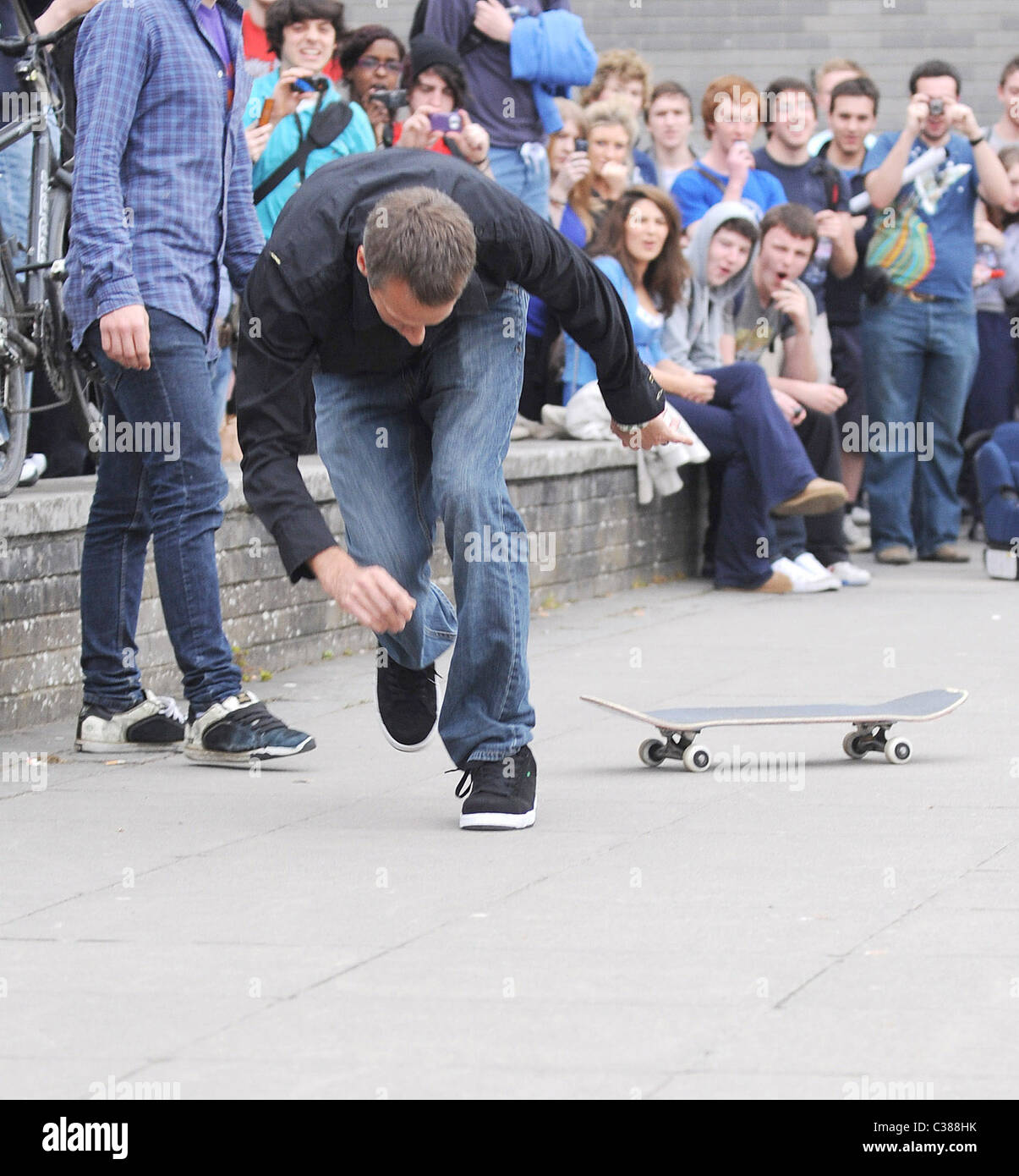 skateboarder Tony Hawk shows off some of his moves before receiving the ...