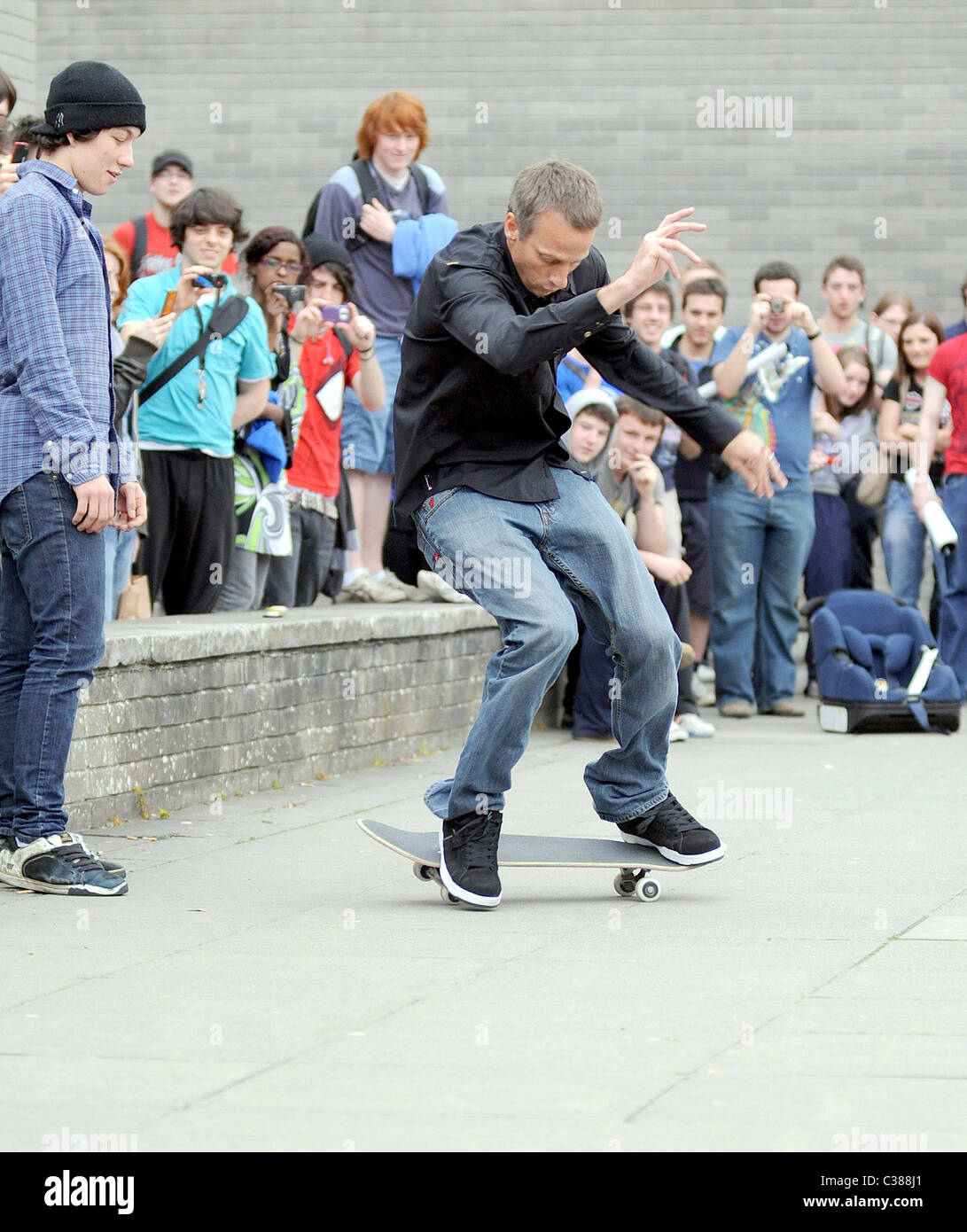 skateboarder Tony Hawk shows off some of his moves before receiving the ...