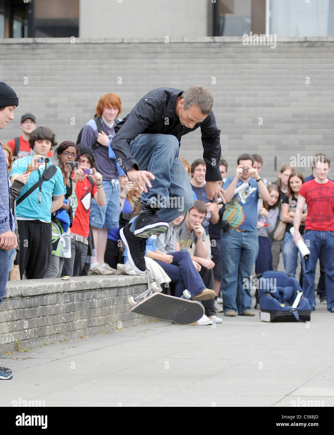 skateboarder Tony Hawk shows off some of his moves before receiving the ...