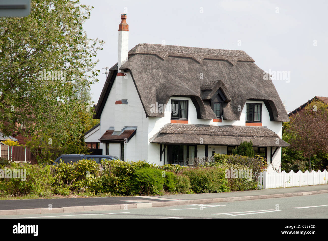A modern built house with thatched roof Stock Photo - Alamy