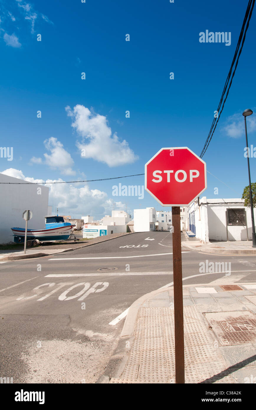 Road junction with red stop sign Fuerteventura Canary Islands Stock ...
