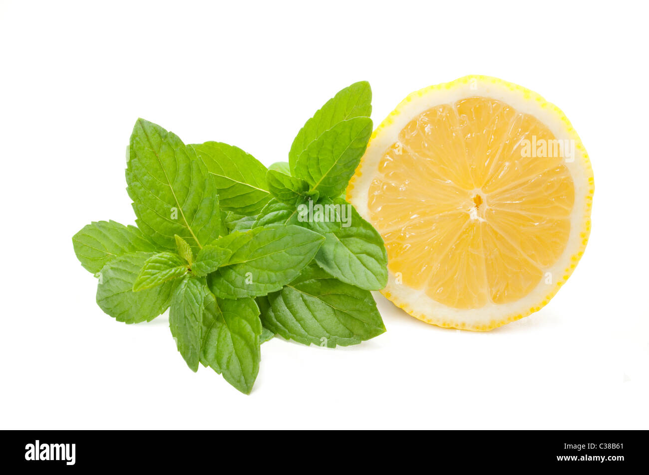 Yellow lemon with mint Stock Photo - Alamy