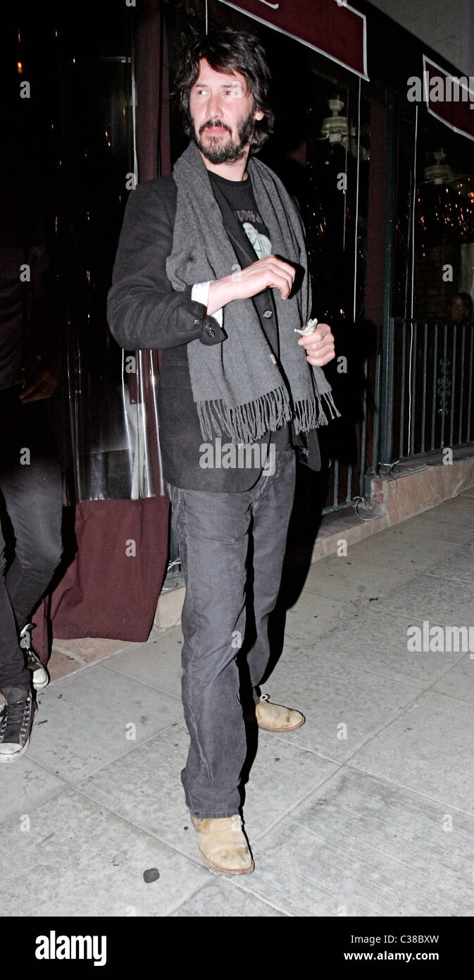 A drunk-looking Keanu Reeves leaving Il Sole in West Hollywood Los ...