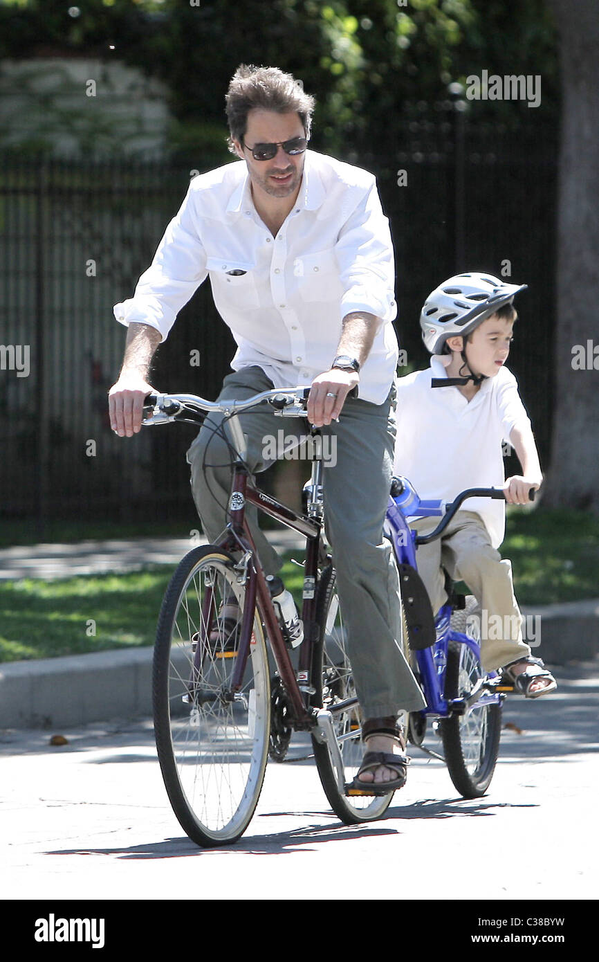Will and Grace' star Eric McCormack riding a tandem bicycle with his ...