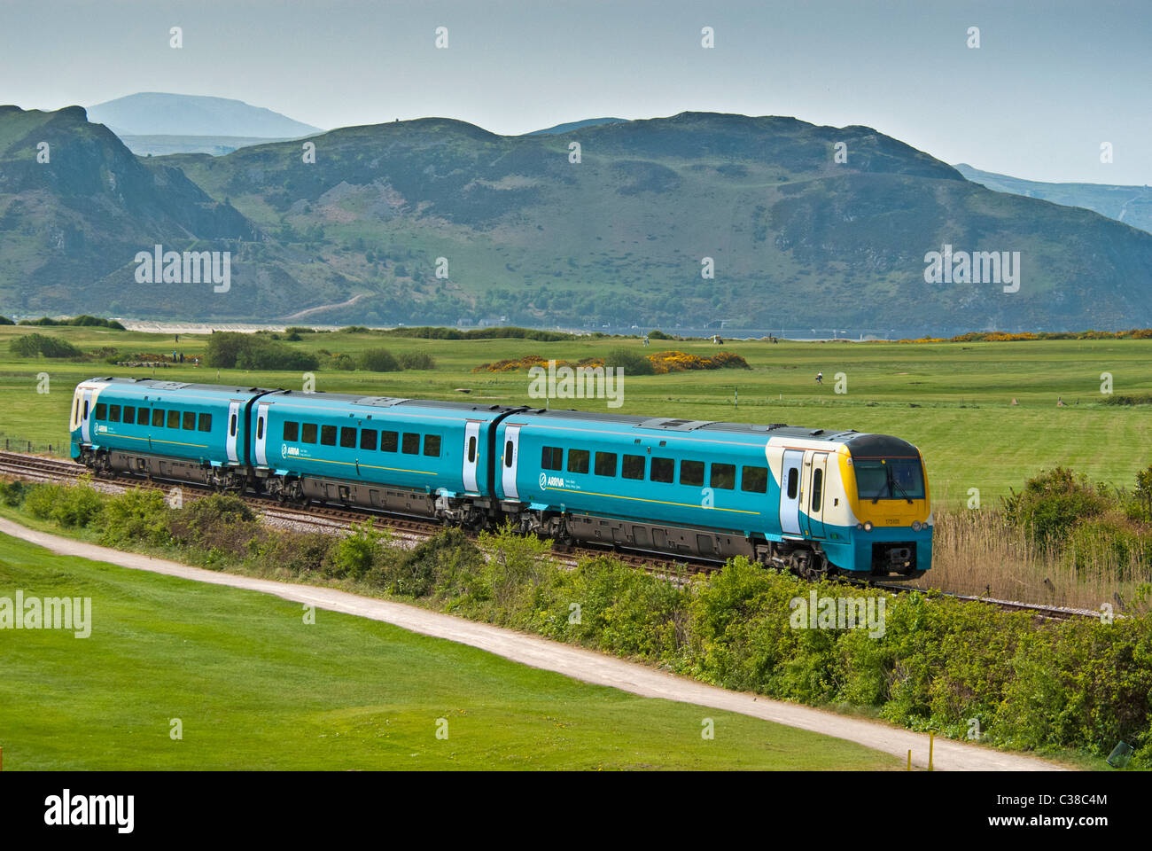 Arriva diesel train DMU approaching Llandudno in North Wales Stock ...