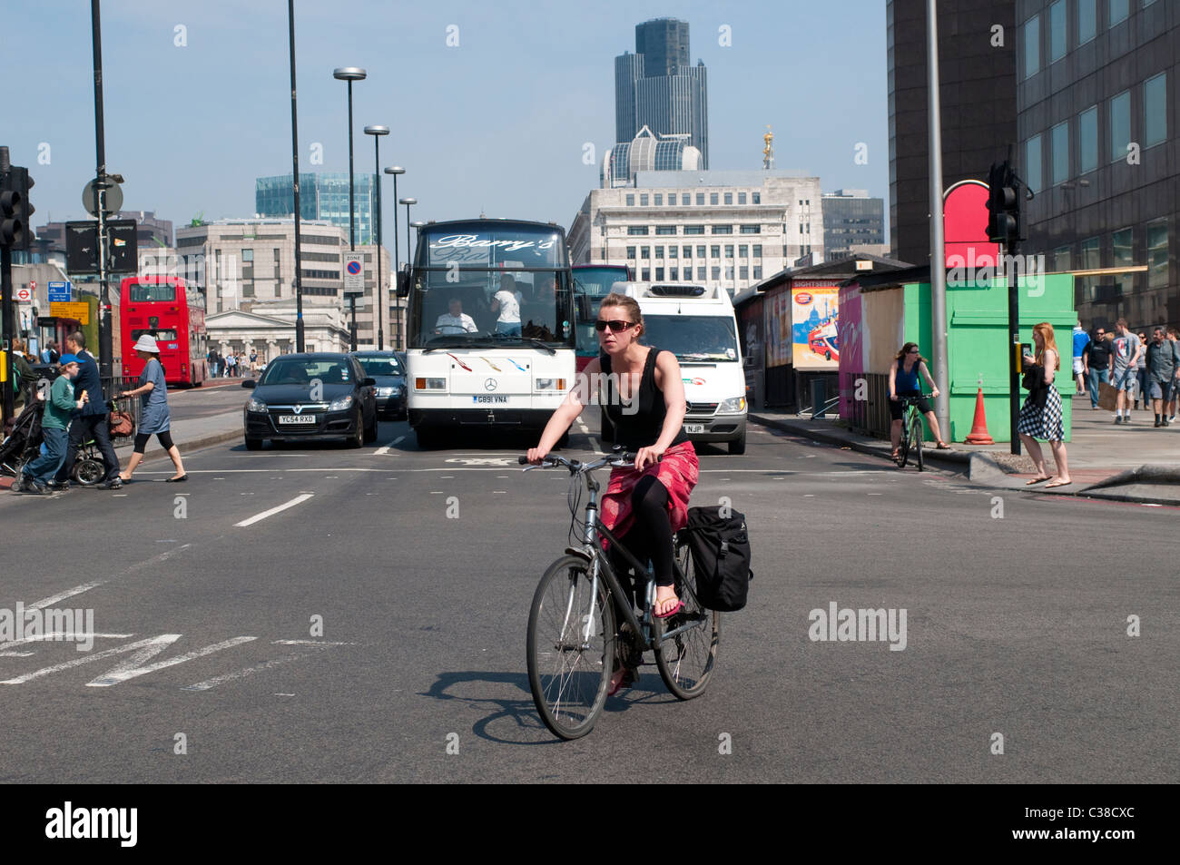 Cyclists and traffic on London Bridge, A3, London, UK Stock Photo - Alamy