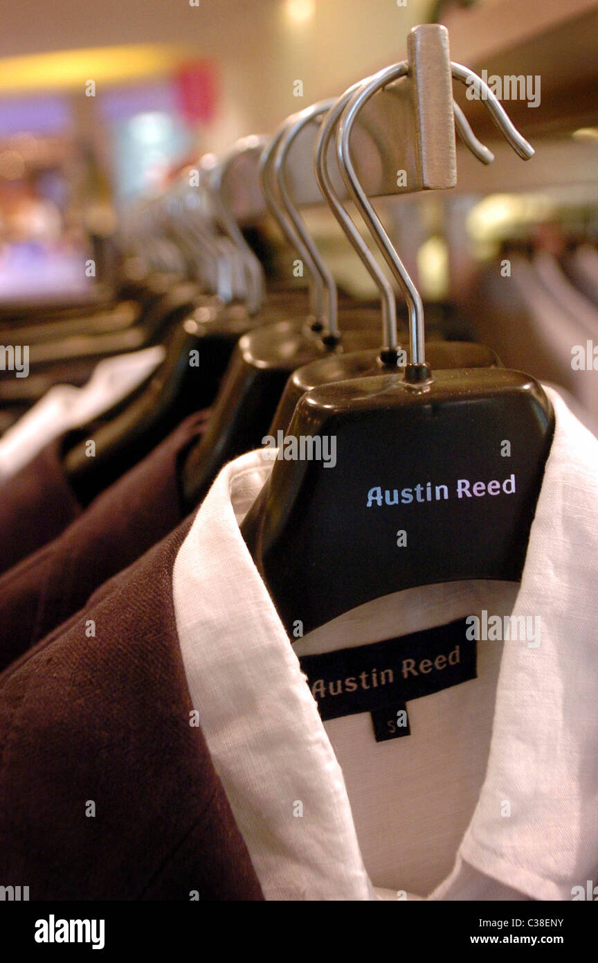 A rail of suit jackets and shirts inside an Austin Reed store Stock ...