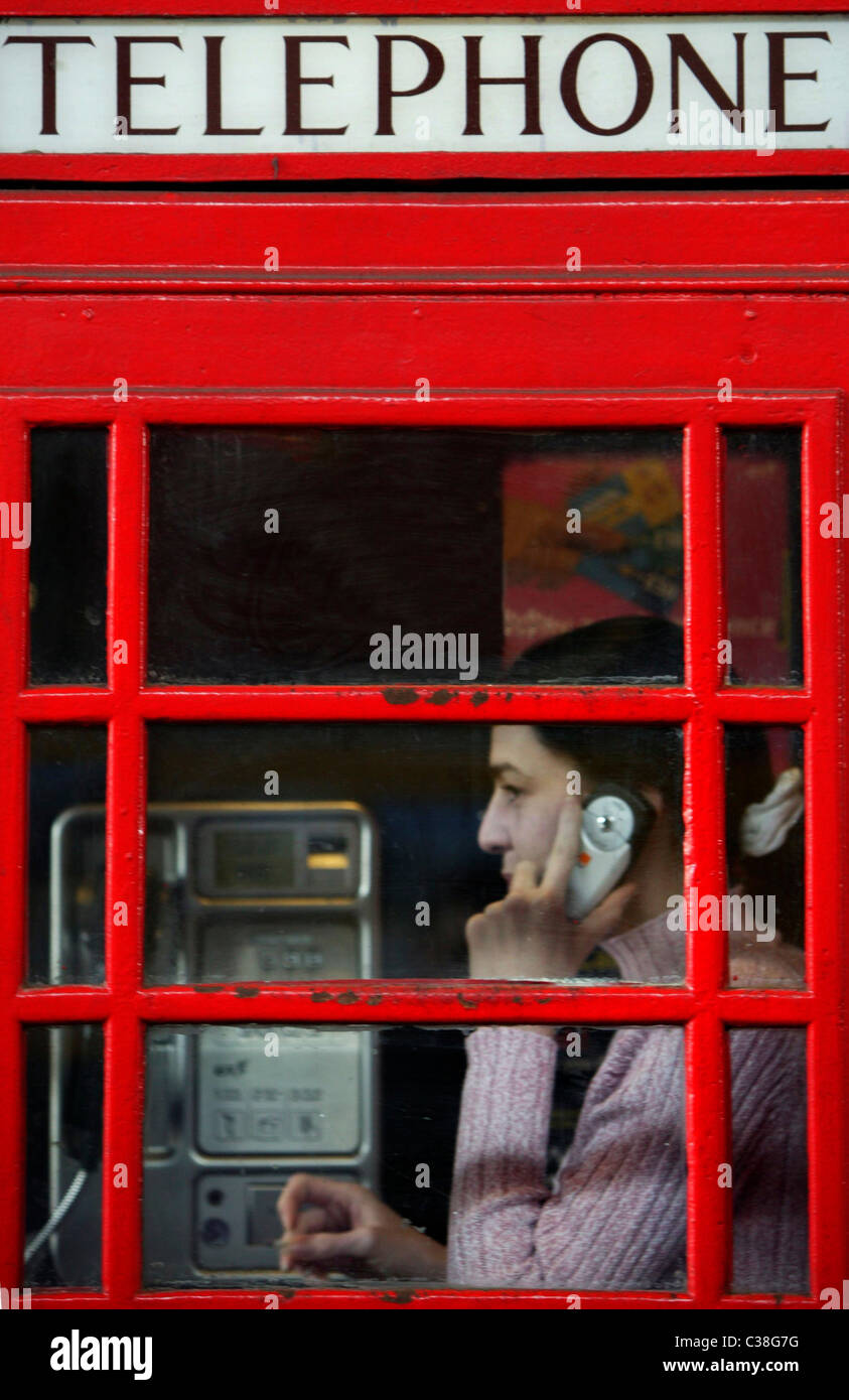 Using a public payphone hi-res stock photography and images - Alamy