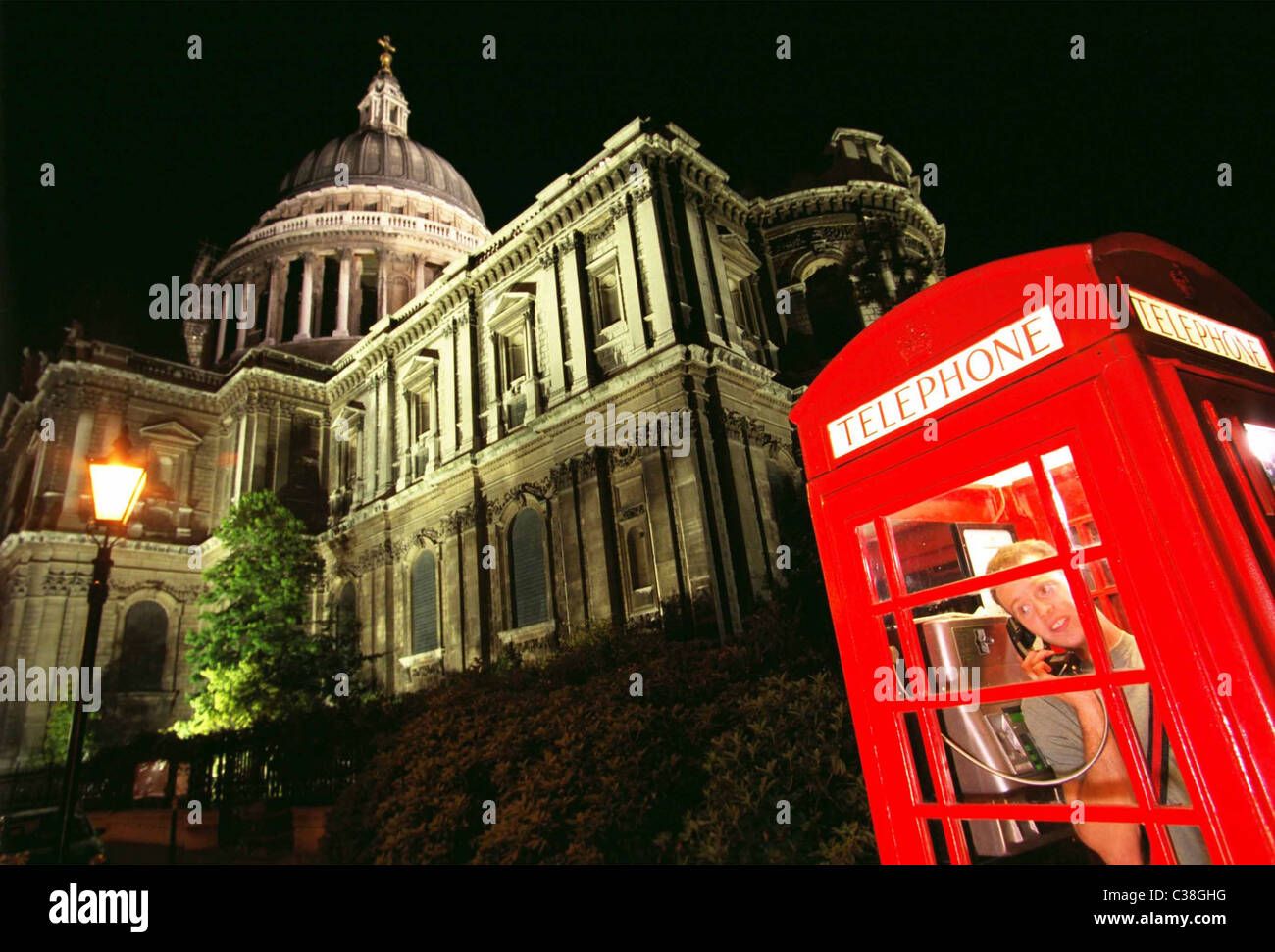 Phone booth night man hi-res stock photography and images - Alamy
