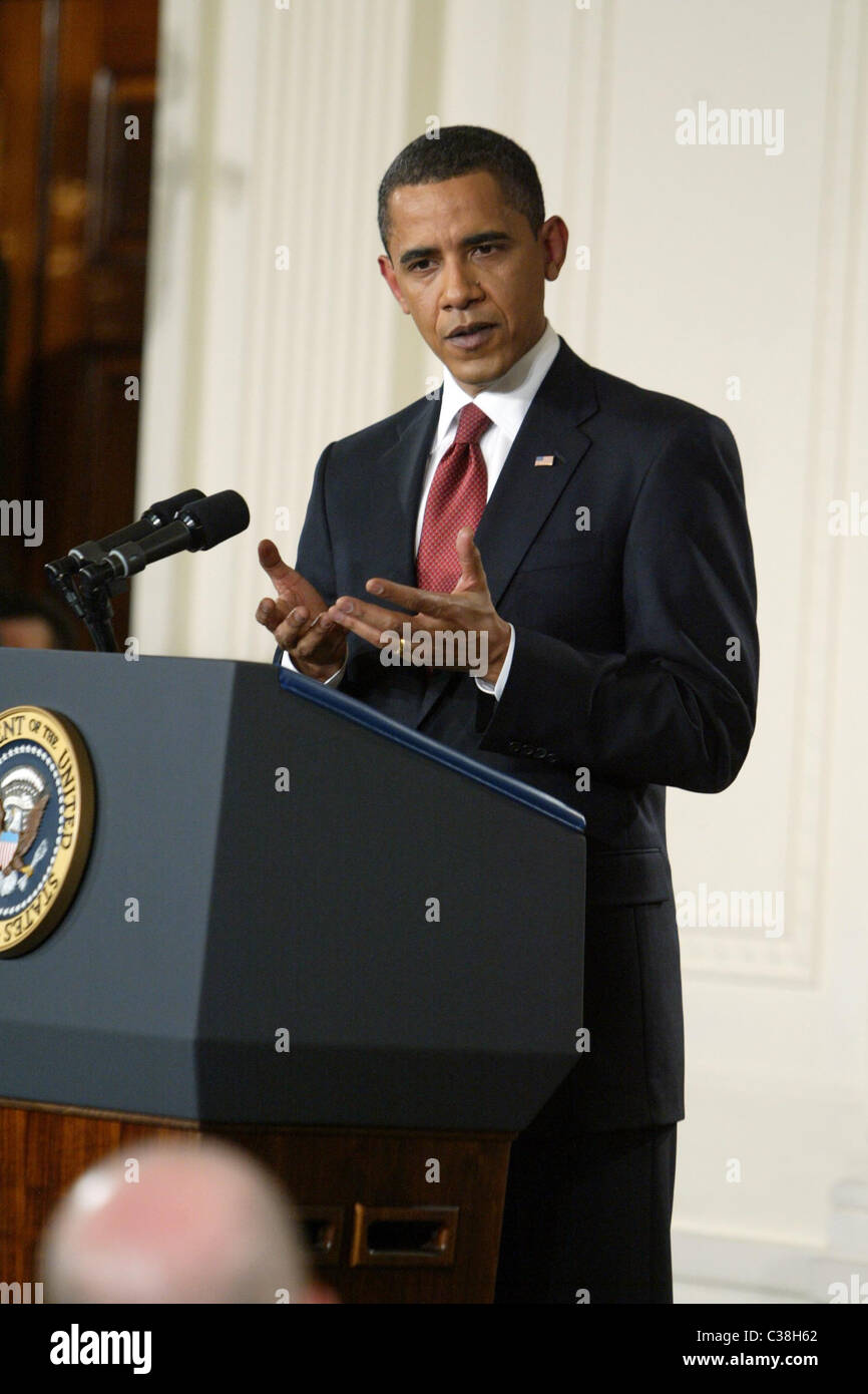 U.S. President Barack Obama answers questions in the East Room of the ...