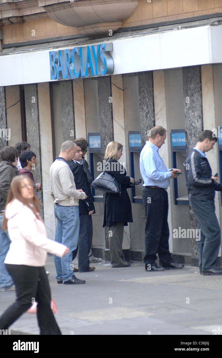 Queueing cash machine hi-res stock photography and images - Alamy