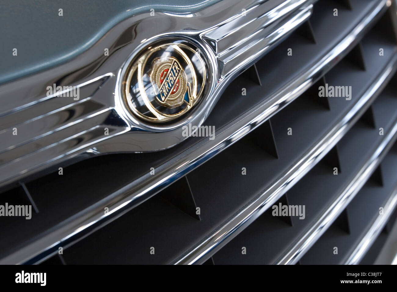 Chrysler badge logo mounted on the front of a car Stock Photo - Alamy