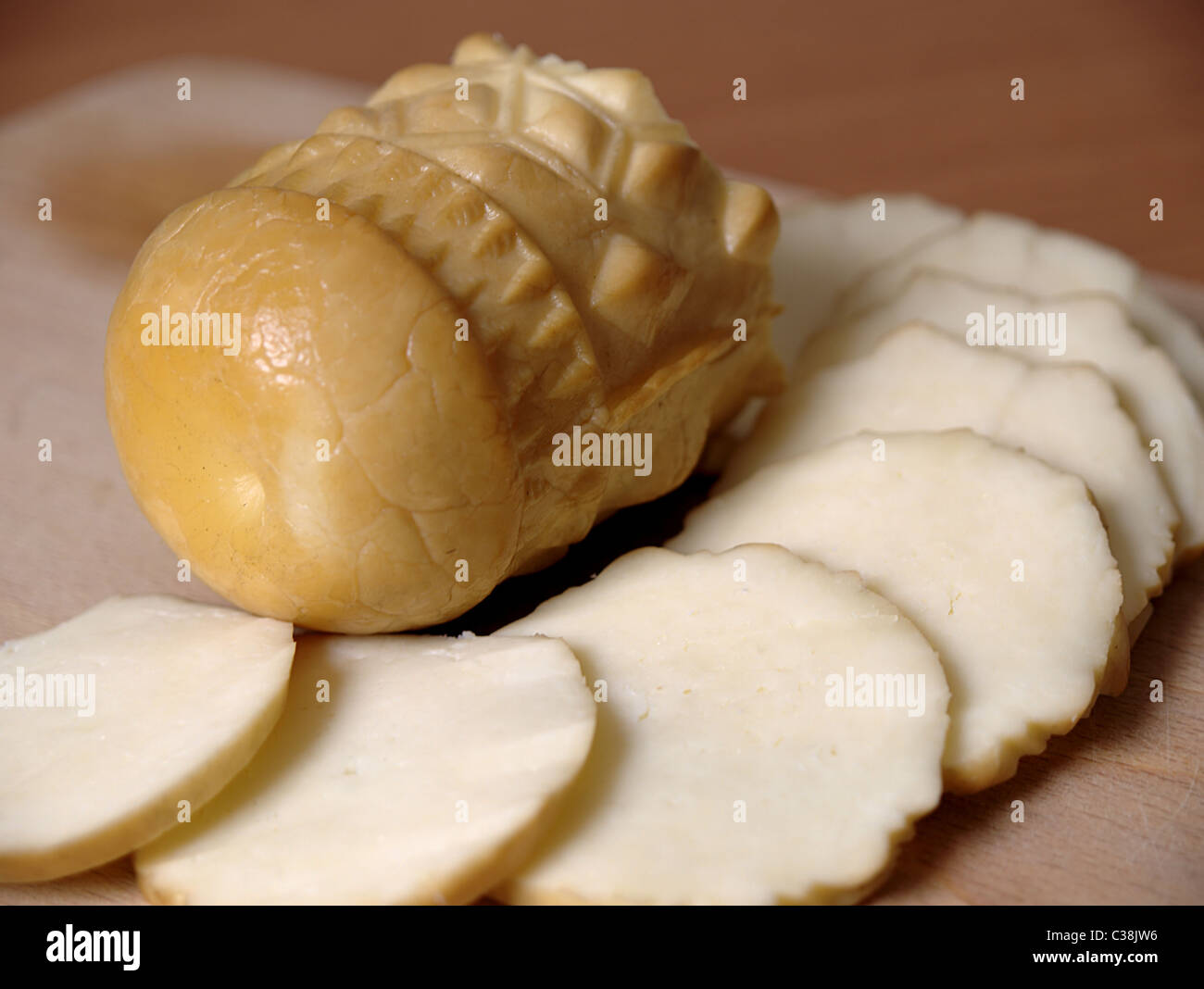 sliced, smoked, yellow cheese – local cuisine Stock Photo - Alamy